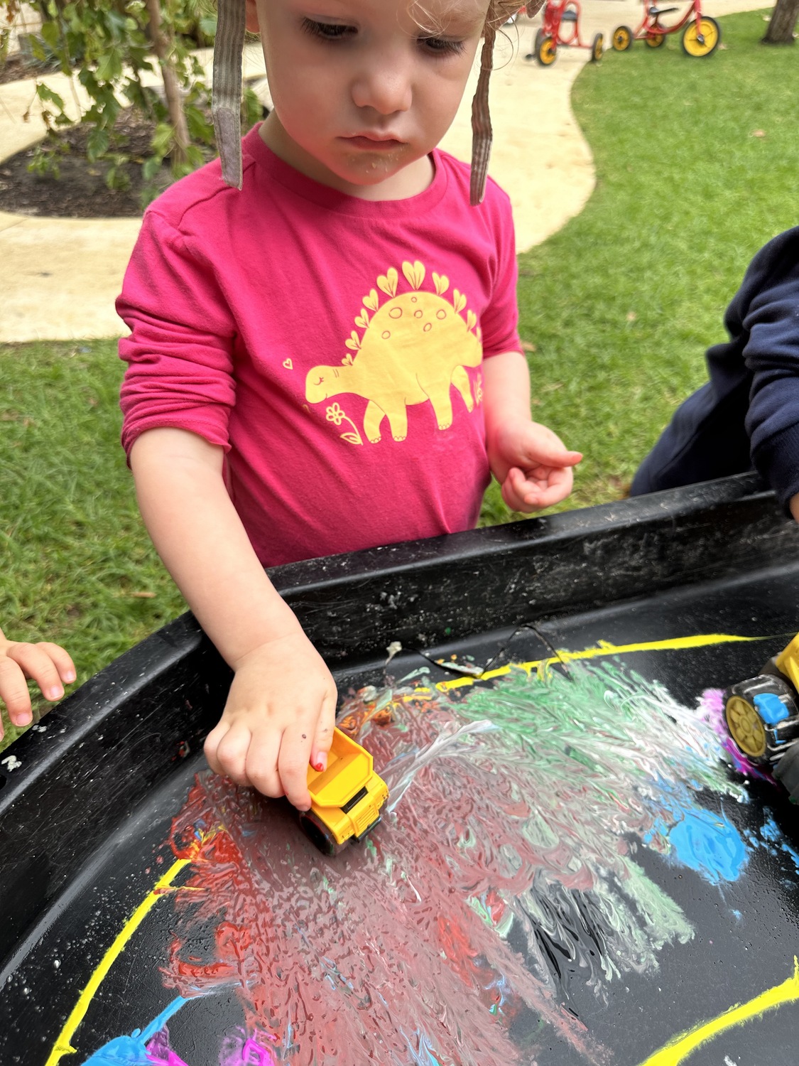Sonas Atwell - Painting with Trucks - Sonas Childcare