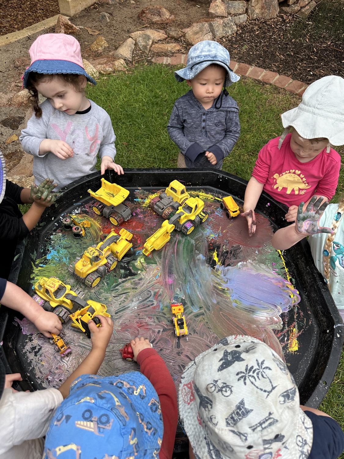 Sonas Atwell - Painting with Trucks - Sonas Childcare